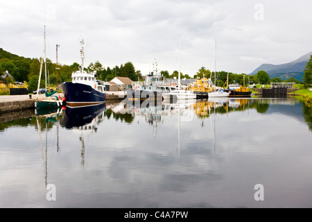 Boats moored in Corpach Basin, entrance to the Caledonian Canal, at ...