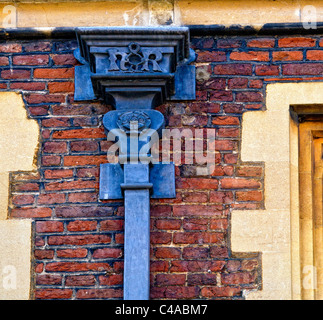 Detail of a cast iron drainpipe and gutter on a medieval church in ...