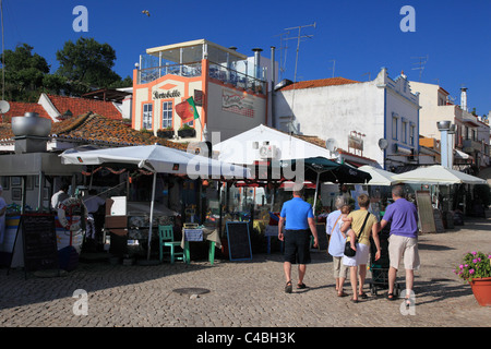 Alvor street and restaurants Algarve Portugal Stock Photo - Alamy