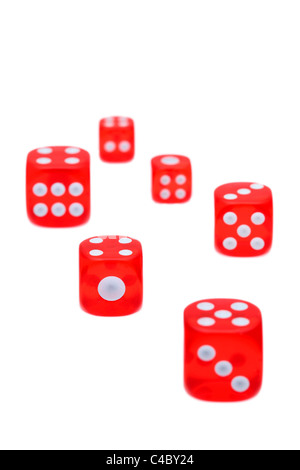 plastic transparent dice cube with colored dots on black background ...