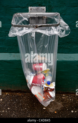 Plastic see through rubbish bins Stock Photo - Alamy
