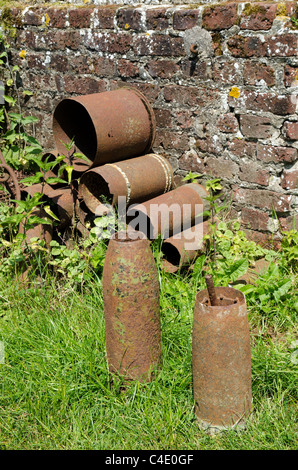 Pile of rusty First World War One artillery grenade shells, dug up in ...