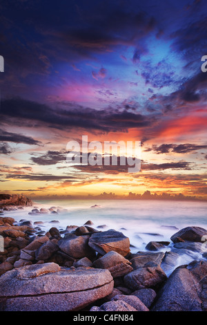 Long exposure shot of coastline sunset Stock Photo - Alamy