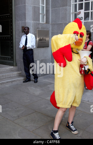 Activists from Compassion in World Farming stage a protest about ...