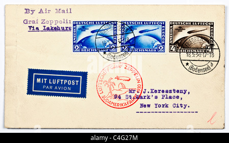 Old German postal envelope with a letter with stamps, postmark, with ...