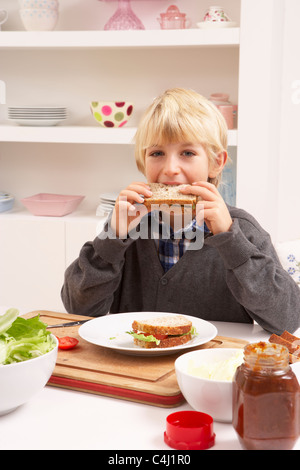 Boy Making Sandwich In Kitchen Stock Photo - Alamy