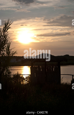 Sunset on the lake, Lago Patria, Naples, Italy Stock Photo - Alamy