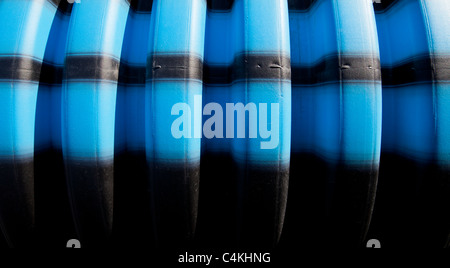 Blue and black stripes on grooved PVC water pipe surface Stock Photo ...