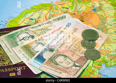 Mauritian Currency Bank notes and coins on map of Mauritius Stock Photo ...