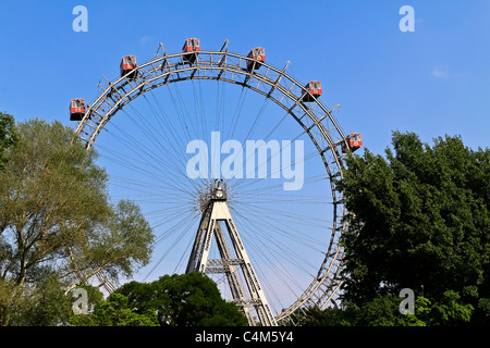 Ferris wheel construction seen from one of the cabins. Part of a white ...