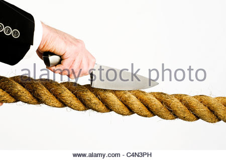 cutting a rope with a knife Stock Photo: 109329613 - Alamy