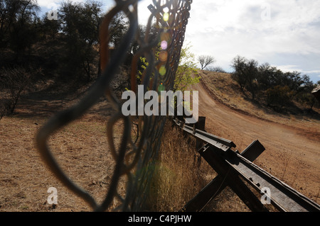 Holes cut in the fence at the Mexican border between Sonora and Lochiel ...