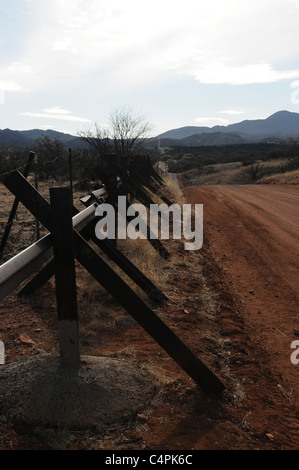 Holes cut in the fence at the Mexican border between Sonora and Lochiel ...