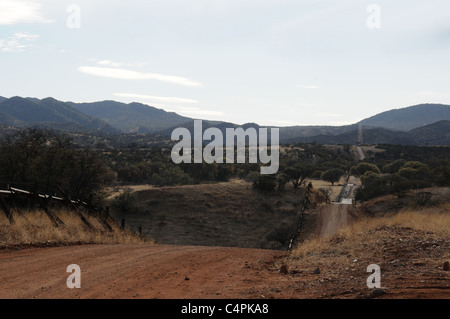 Holes cut in the fence at the Mexican border between Sonora and Lochiel ...