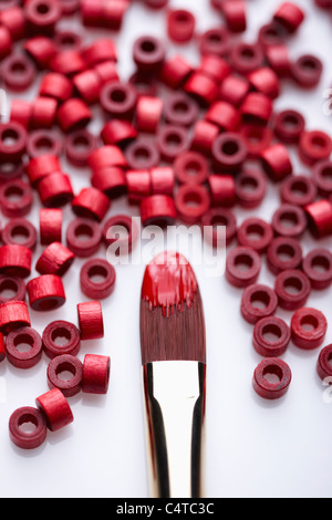 red color rolls and brushes Stock Photo - Alamy