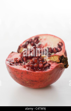 cross section of pomegranate and seeds for background, wallpaper and ...
