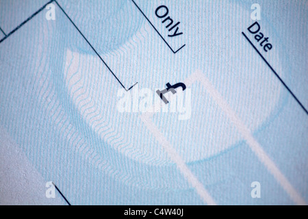 Close up of Barclays Bank cheque check book with and fountain pen ...