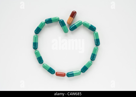 fruit apple drug medicine Stock Photo - Alamy