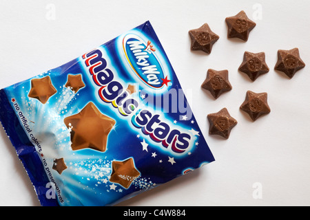 Packet of Milky Way magic stars chocolates with contents spilled spilt ...