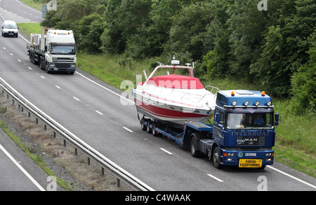 A speed boat is transported on a lorry. Picture by James Boardman Stock ...
