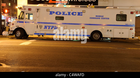 NYPD mobile command and communications truck surrounded by new york ...