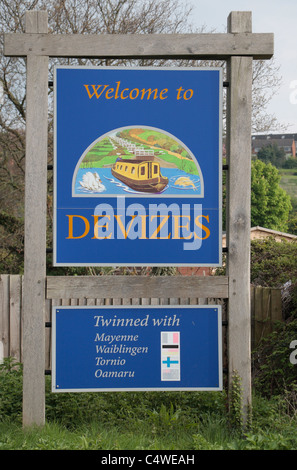 Town sign Devizes Wiltshire UK reflecting popular Kennet Avon Canal ...