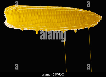 Studio shot of corn cob covered with yellow paint Stock Photo - Alamy