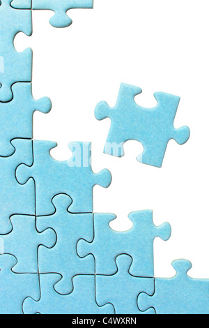 Single jigsaw piece isolated on the blue background Stock Photo - Alamy