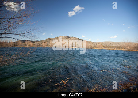 Breeze ruffles surface of clear spring-fed lake at Independence Creek ...