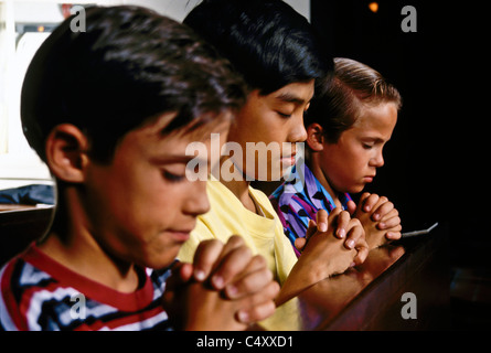 Children praying in a church Stock Photo - Alamy