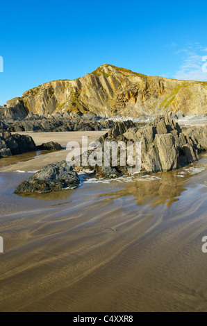 The beach and cliffs at Rockham Bay, Mortehoe, Devon, England Stock ...