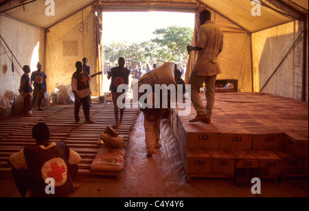 Workers for the tanzania red cross at the distribution centre, Lugufu ...