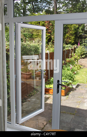 opening and closing new PVC windows and doors Stock Photo - Alamy