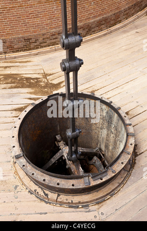 Steam powered water pump, pumping water into large brass cylinder Stock ...