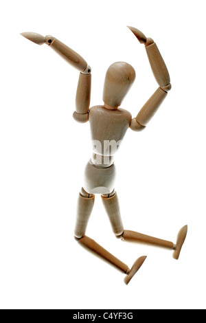 Wooden puppet is dancing . Isolated background Stock Photo - Alamy