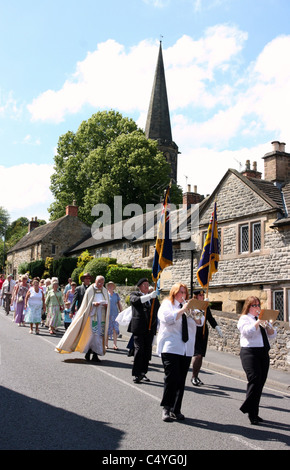 Bakewell carnival parade in Derbyshire 2009. marching band in kilts ...