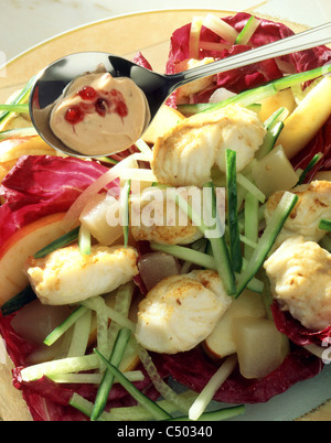 cod fish salad, pickled cucumber, egg and potatoes Stock Photo - Alamy