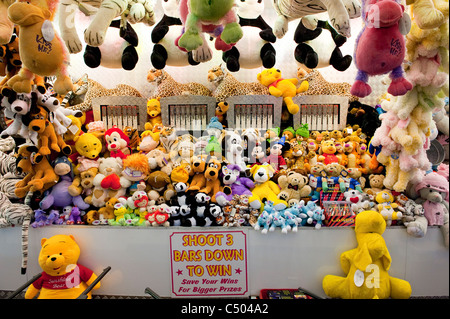 Game stalls and prizes at a fairground Stock Photo - Alamy