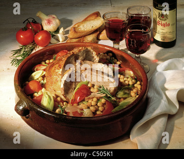 Leg of Lamb with Thyme, Tomatoes and Garlic Stock Photo - Alamy