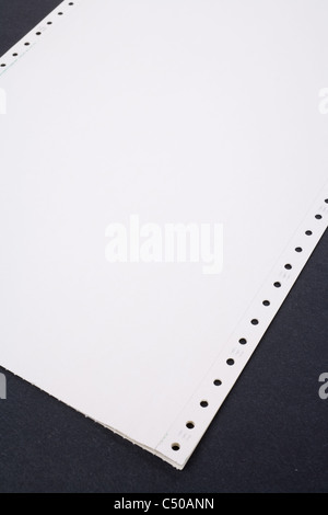 Perforated Computer Paper for background Stock Photo - Alamy