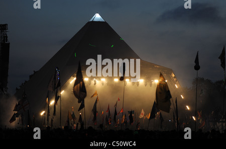 A crowd of people at the Pyramid Stage at the Glastonbury music ...
