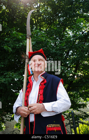 War scythe presented during ethnographic performance at Krakow market ...