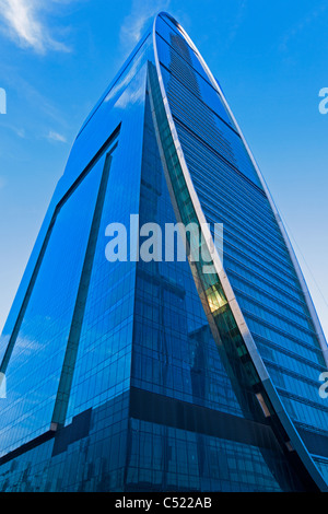 Glass skyscraper stretching into the blue sky Stock Photo - Alamy