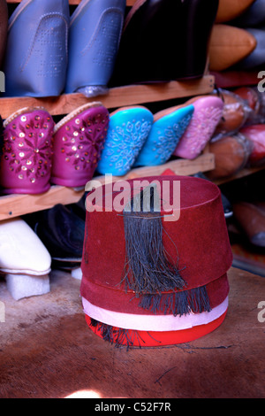 Fez hat and leather shoes for sale Stock Photo - Alamy