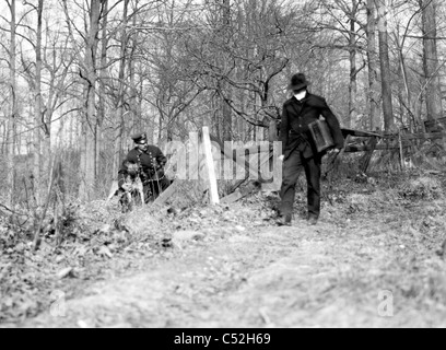 Policeman, police dog, waiting for thief, New York City, 1912 Stock ...