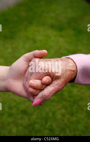 End of coronavirus pandemic. Happy women taking off medical masks ...