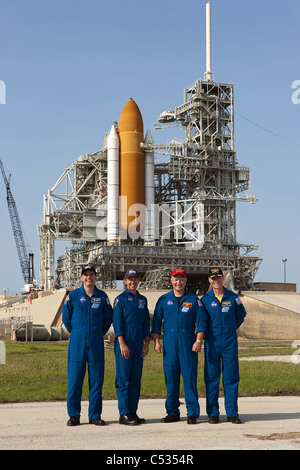 Space shuttle Atlantis crew members (from left) commander Chris ...