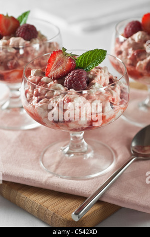 Eton mess, traditional English dessert, strawberry with cream, meringue ...