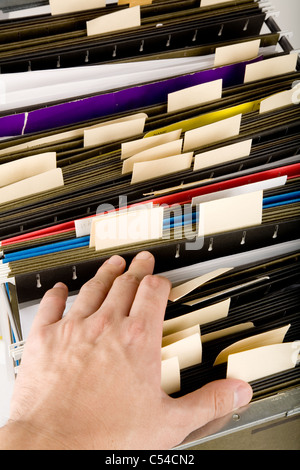 searching a file, business concept Stock Photo - Alamy