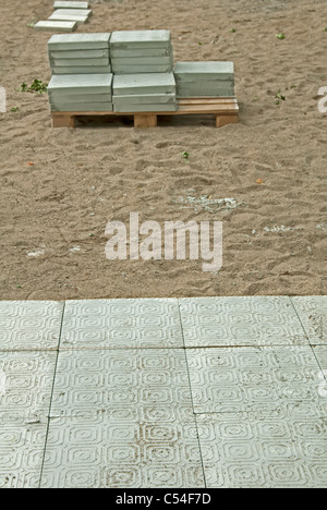 Tile paths construction in park Stock Photo - Alamy